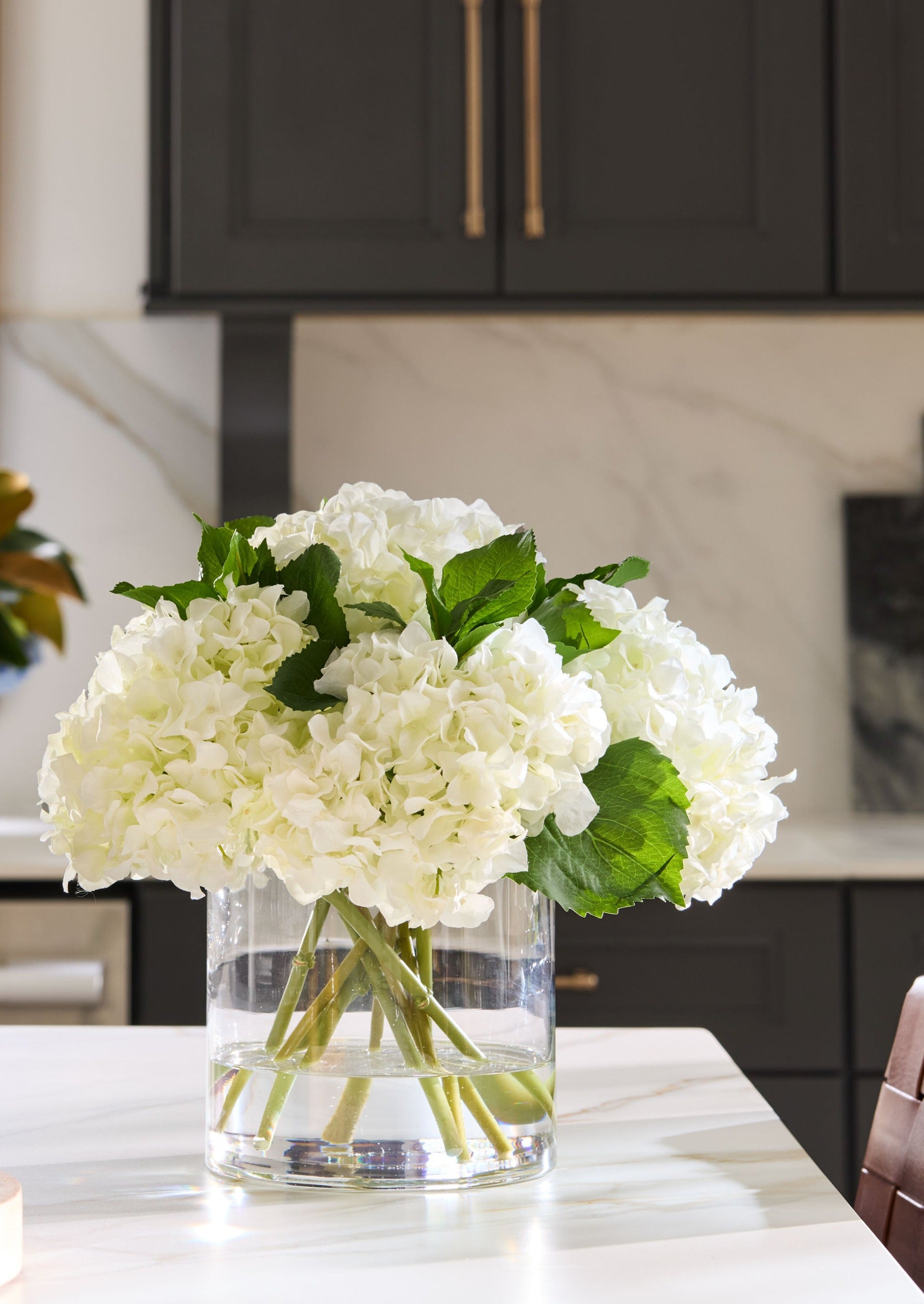 Artificial flower arrangements in vase store